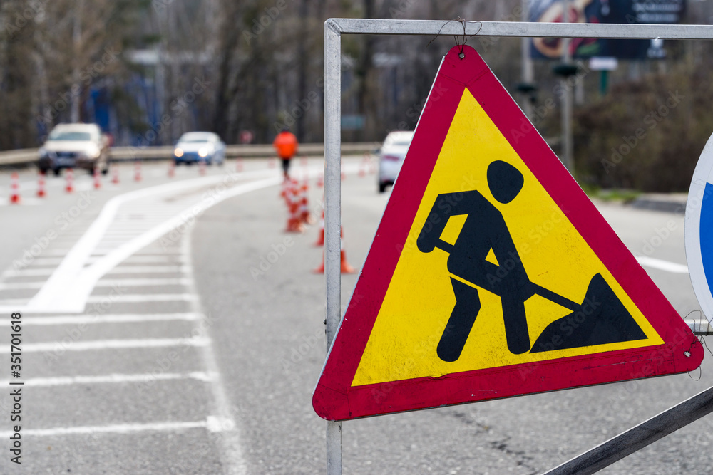 road signs informing about road repair, car signs for traffic control ...