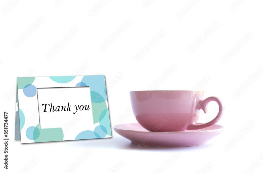 Pink porcelain cup of tea with thank you card on white background. Card ...