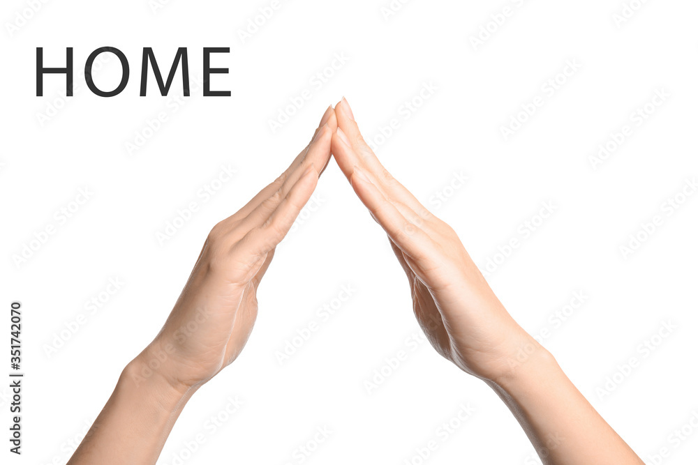 Woman showing word Home on white background, closeup. American sign ...
