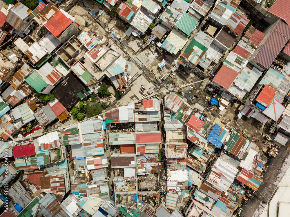 Top view of a impoverished squatter area with narrow passageways and ...