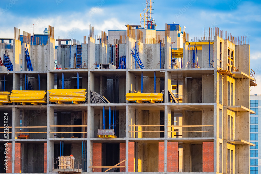 The process of building a multi-storey building. The frame of a ...