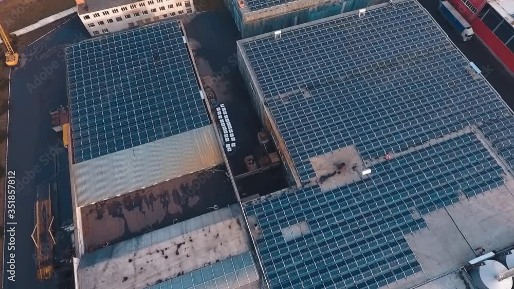 Innovative solar station on roofs. Photovoltaic cells on a huge solar ...