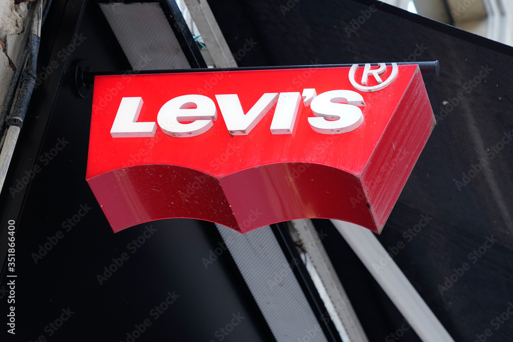 Levi's Jeans Sign and Logo levis on store window Stock Photo | Adobe Stock