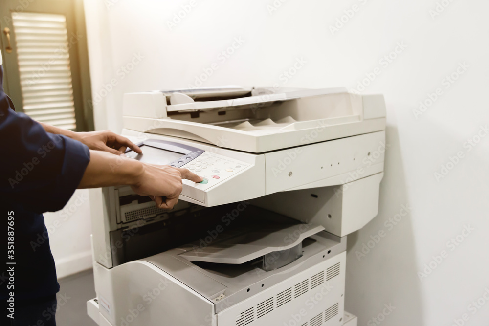 Business people keypad hand on the panel printer, printer, scanner ...