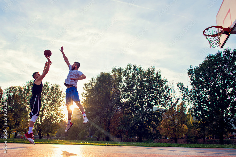 People Playing Street Basketball
