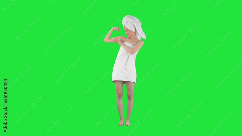 Girl power concept. Young slim beauty woman in towel after shower ...