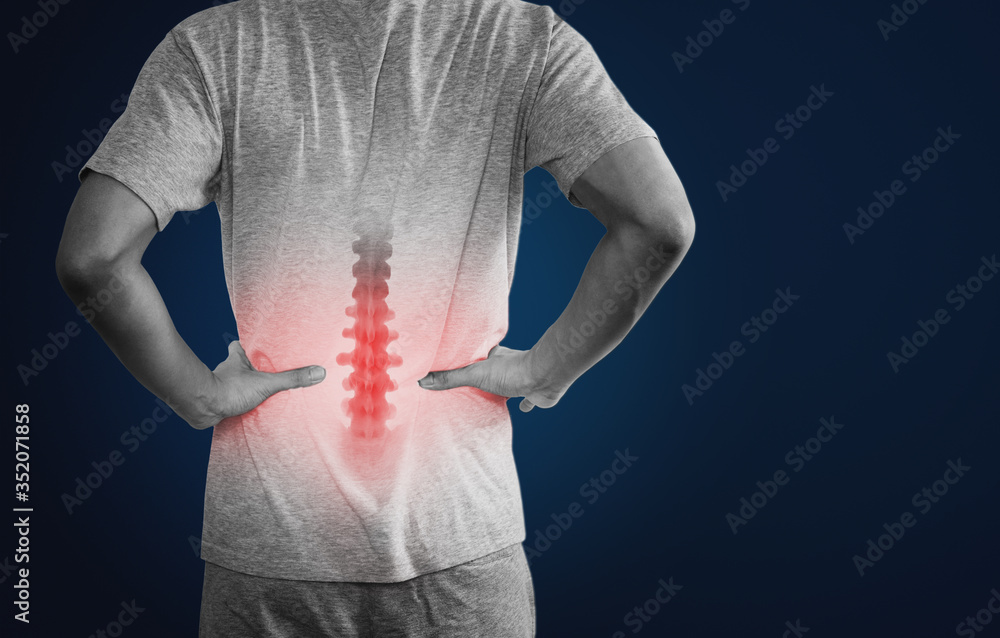 a man touching his lower back at pain point. Office syndrome, Backache ...