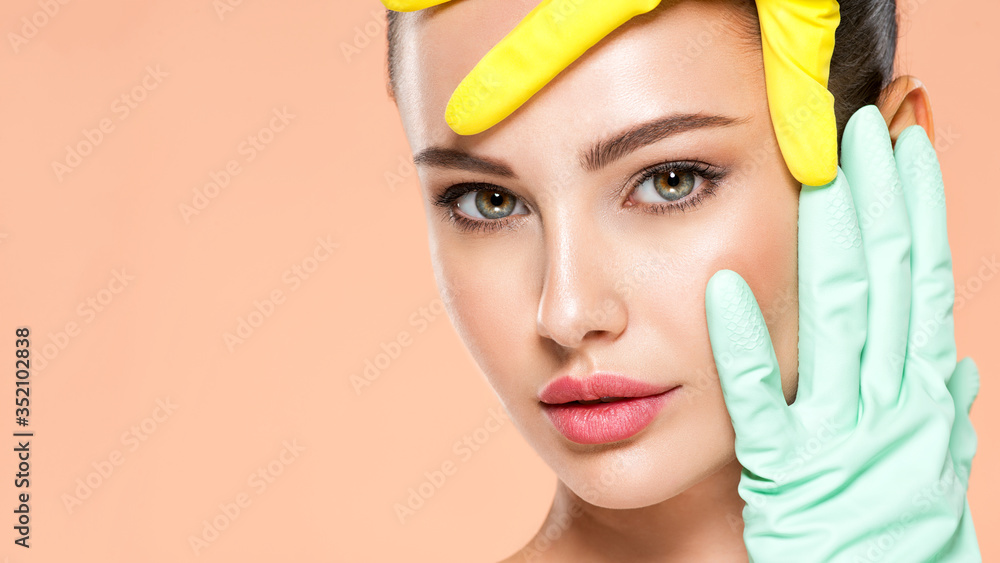 Face skin check before plastic surgery. Beautician touching young woman ...