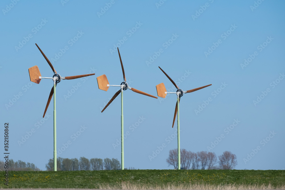 Groningen, the Netherlands - April 29 2020: Small wind turbines with ...
