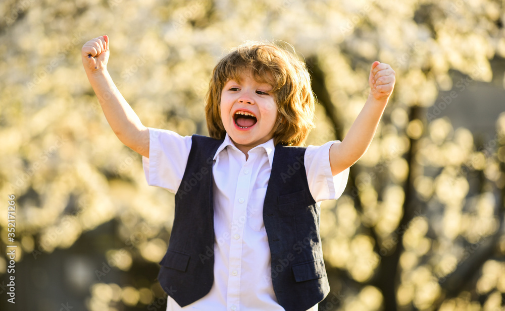 Excited kid. Adorable boy spring garden. International childrens day ...
