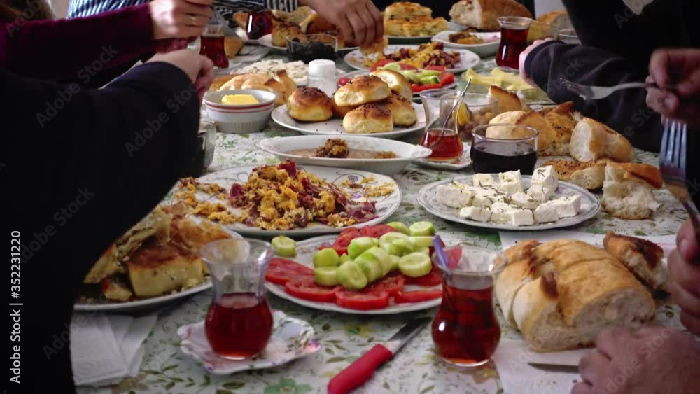Muslim family having breakfast together celebrating eid-ul-fitr after ...