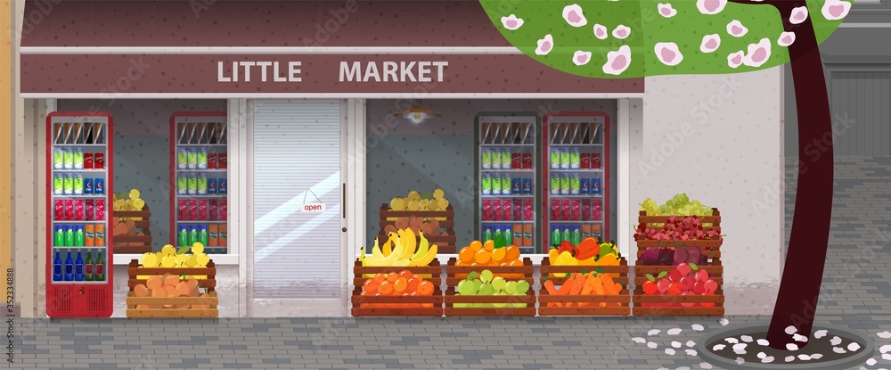 Local fruit and vegetables store building. Groceries crates in front of ...