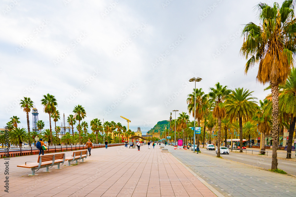Barcelona, Spain. Wide sidewalk in La Rambla with benches, people ...