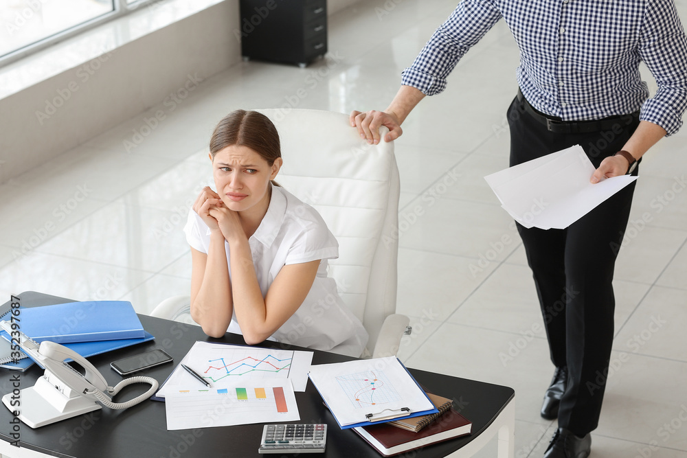 Angry boss scolding his secretary in office Stock Photo | Adobe Stock