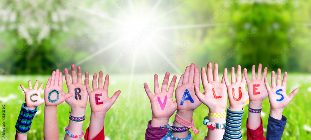 Children Hands Building Colorful Word Core Values. Sunny Green Grass ...