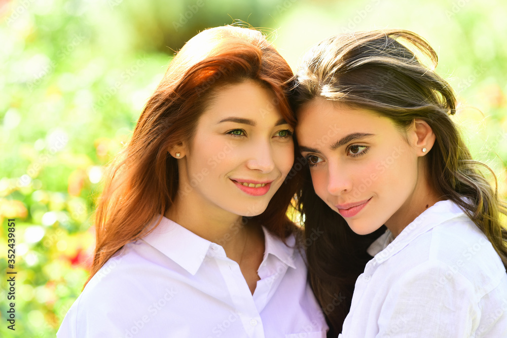 Close up lifestyle portrait of two pretty best friends girls, having ...