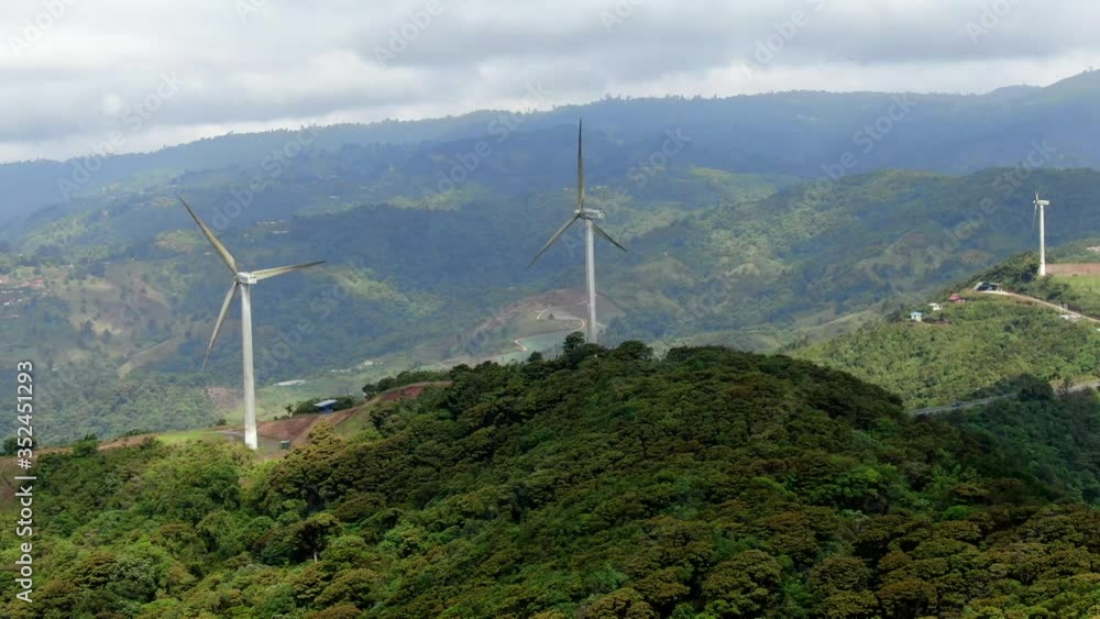 Beautiful cinematic aerial view of the eolian renewable energy wind ...