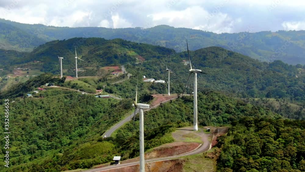 Beautiful cinematic aerial view of the eolian renewable energy wind ...