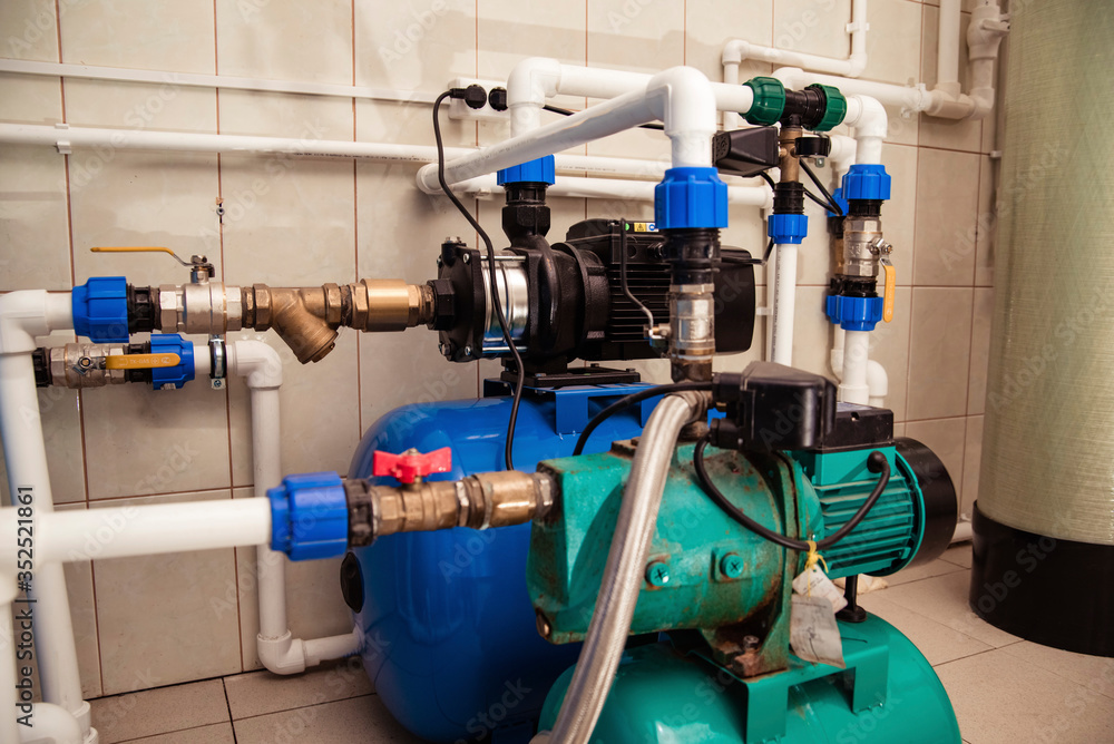 Water centrifugal pump and motor line with pipe. Stock Photo | Adobe Stock
