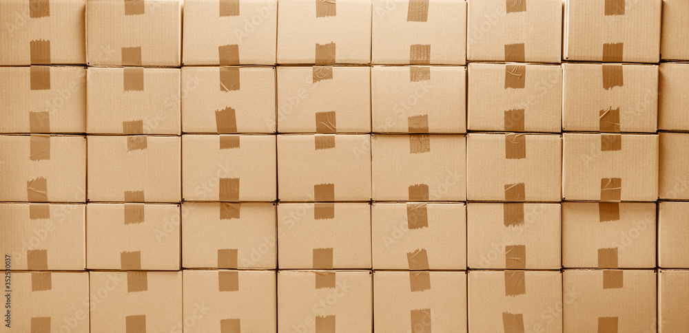 Cardboard boxes texture for delivery or moving. Stack of boxes and blue ...