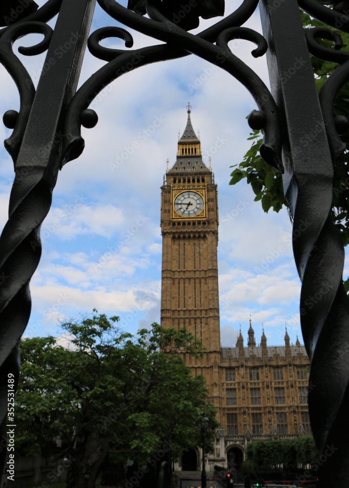 London's Big Bend clock tower framed in metal gate. Iconic English ...