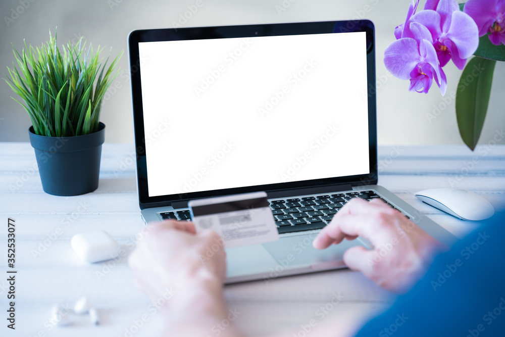 internet shopping concept, Laptop computer white blank screen on work ...