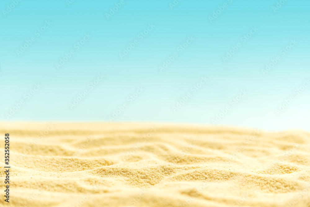 Tropical sandy beach with blurry blue ocean and sky. Summer background ...