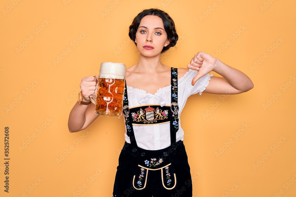 Beautiful german woman with blue eyes wearing traditional octoberfest ...