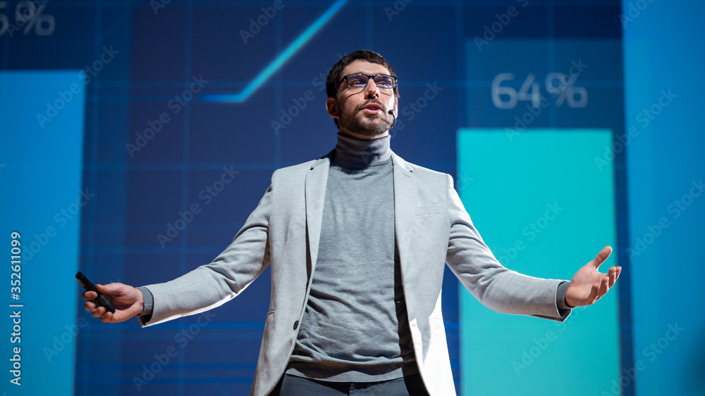 On-Stage Speaker Greets Audience, Presentation of Technological Device ...