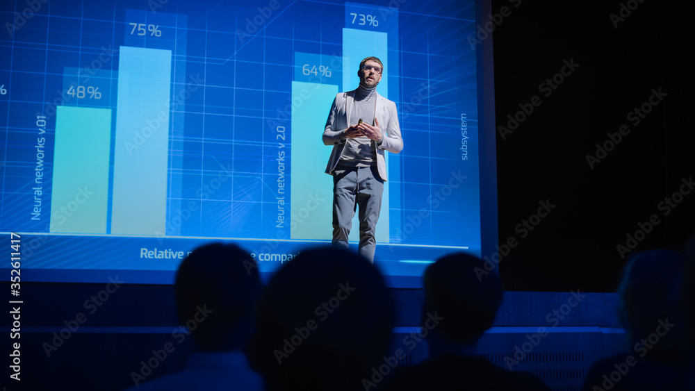 On-Stage: Speaker Does Presentation of the New Electronic Product ...