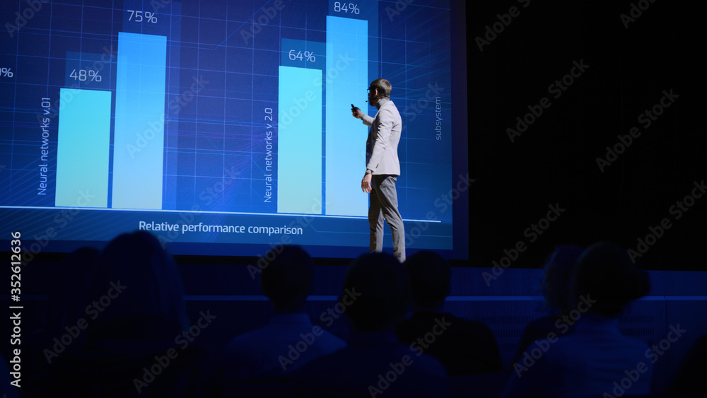 On-Stage: Speaker Does Presentation of the New Electronic Product ...