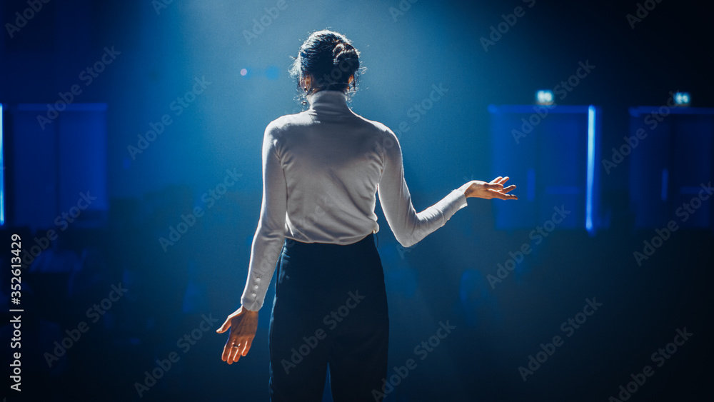 Female Motivational Speaker on Stage, Talking about Happiness ...