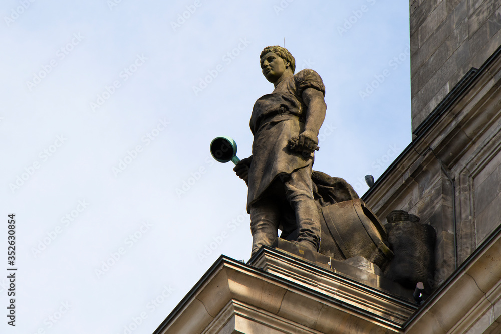 Statue in Berlin. The Reichstag bears silent witness to the turbulent ...