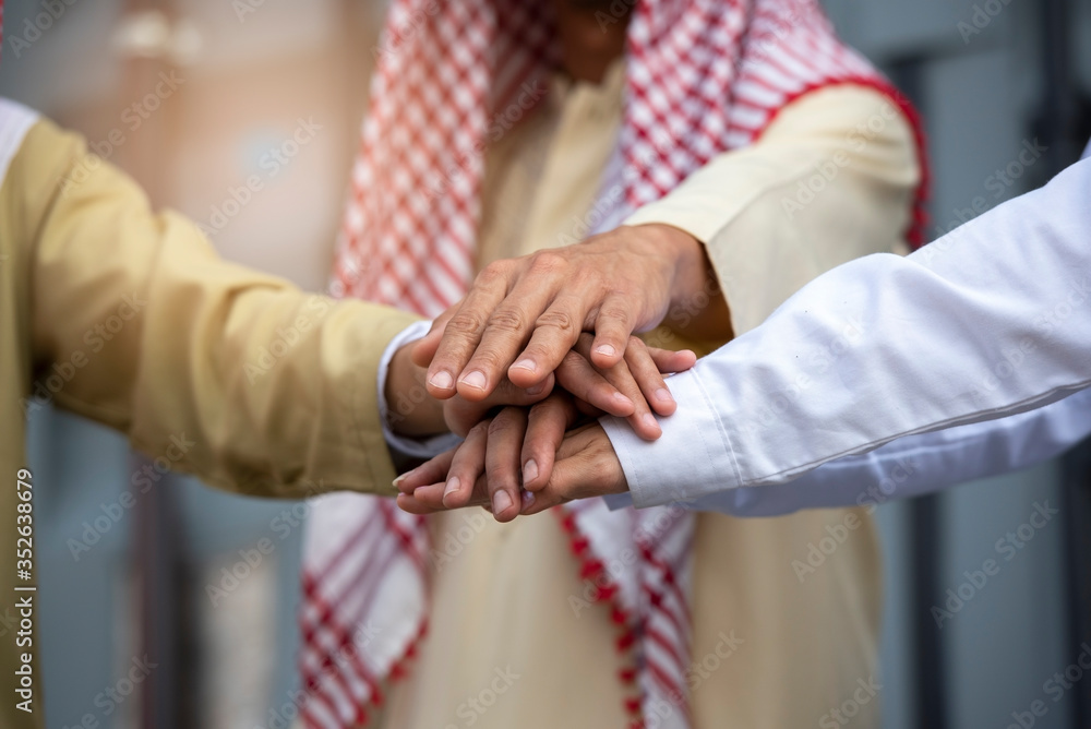 Teamwork of business people united hands together , concepts of Saudi ...