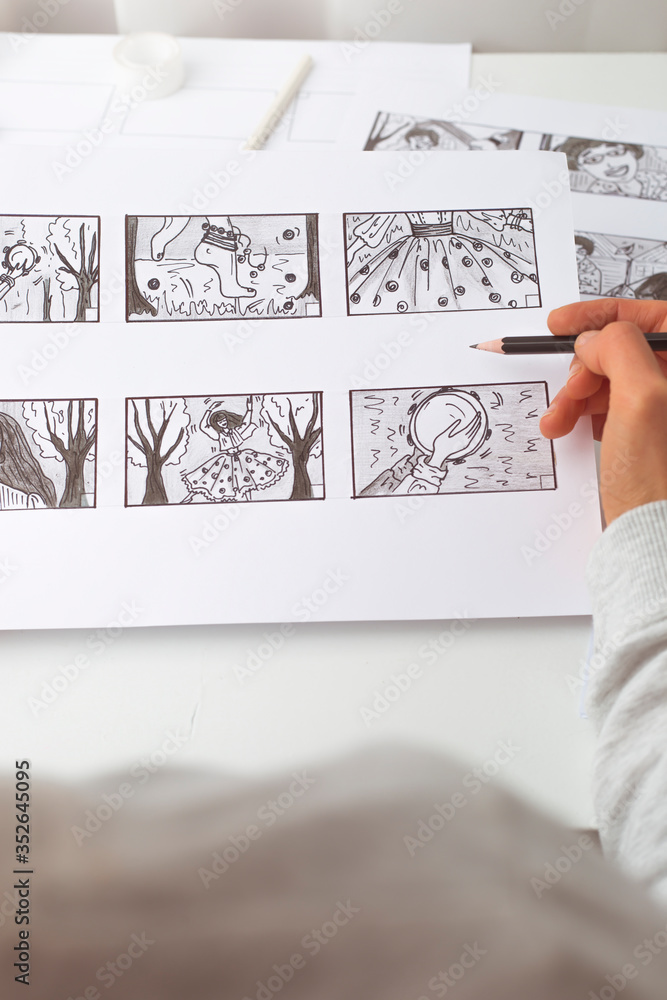 Artist illustrator draws a storyboard for the film. The animator ...