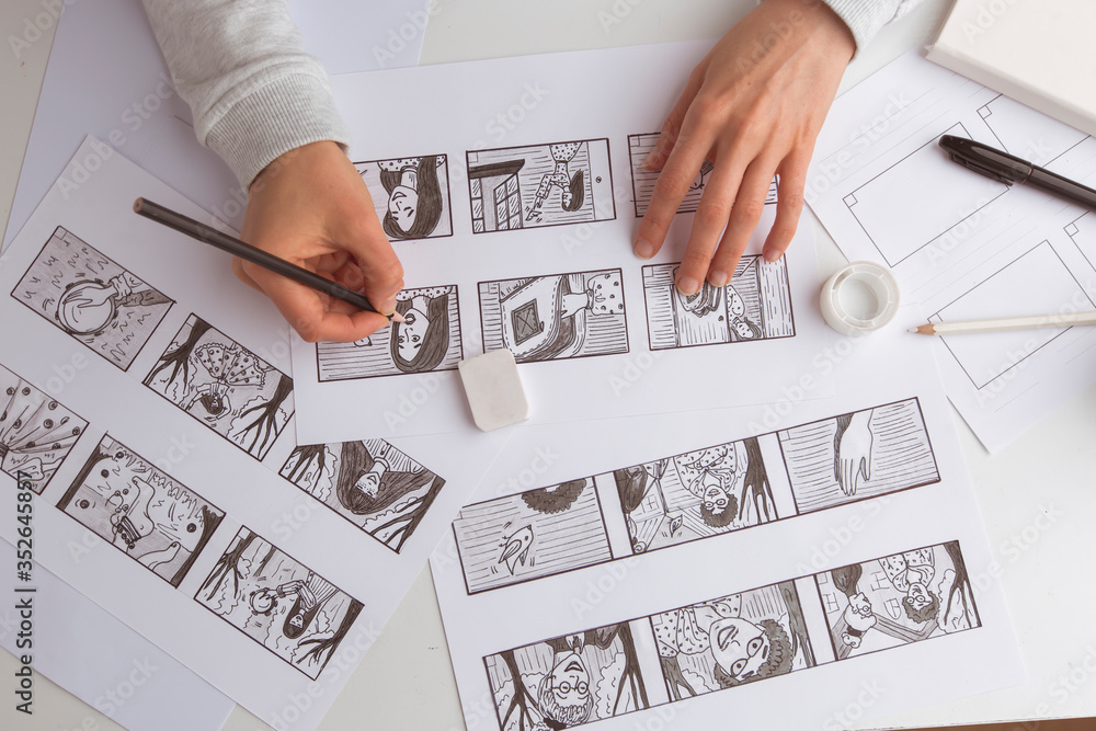 Artist illustrator draws a storyboard for the film. The animator ...