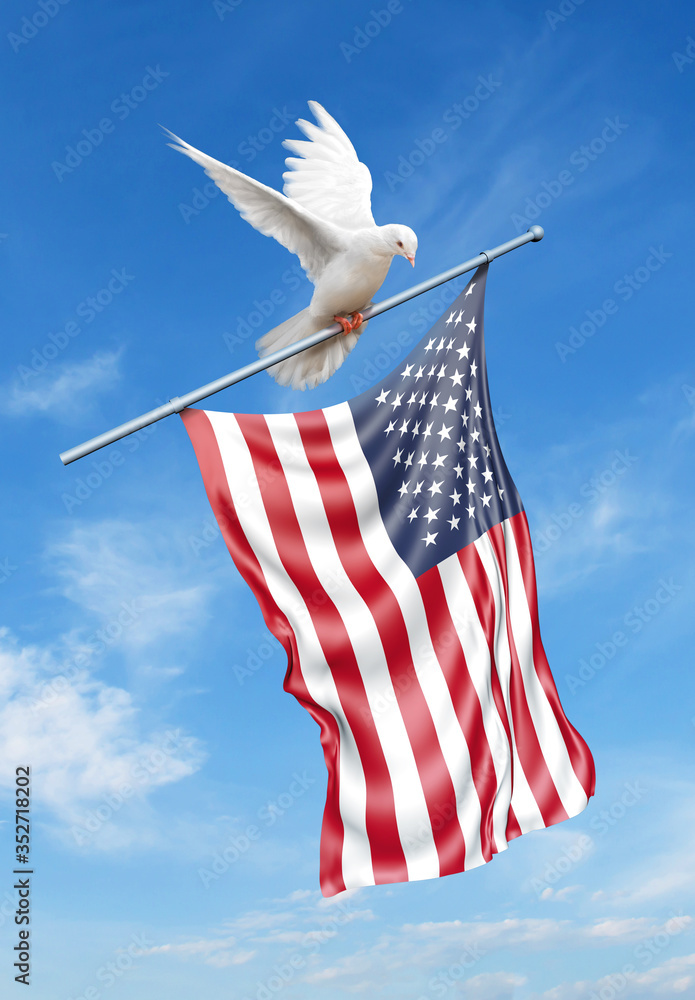 American flag on a pole is carried by a bird while flying against a ...