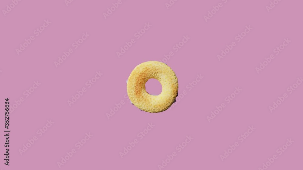 Rotating pink donut on pink background for any purposes. National Donut ...