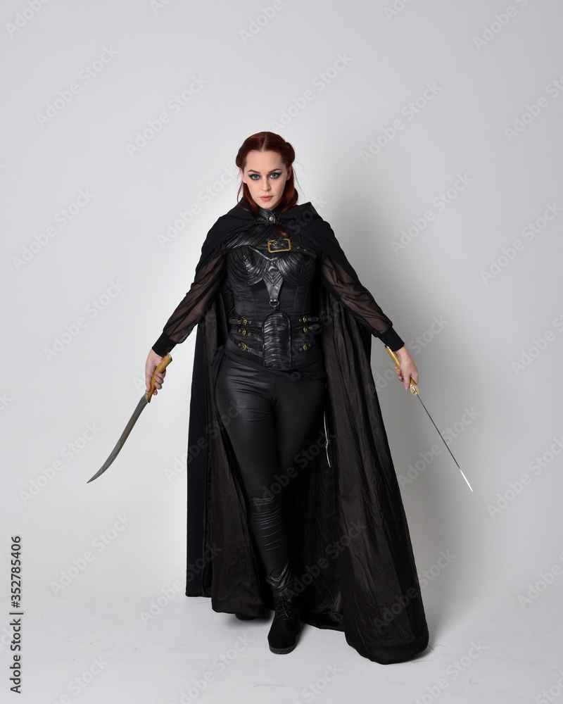 fantasy portrait of a woman with red hair wearing dark leather assassin ...