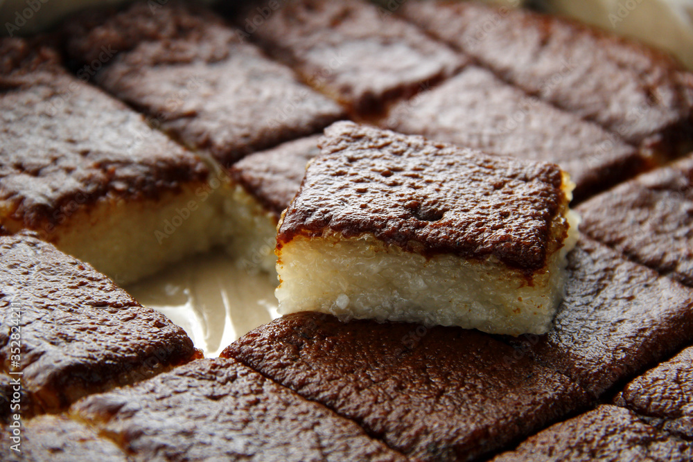Filipino snack food called Bibingka Malagkit Stock Photo | Adobe Stock