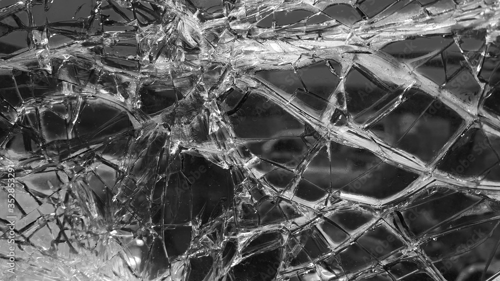 The broken windshield of the car. Glass splinter. An accident with the ...