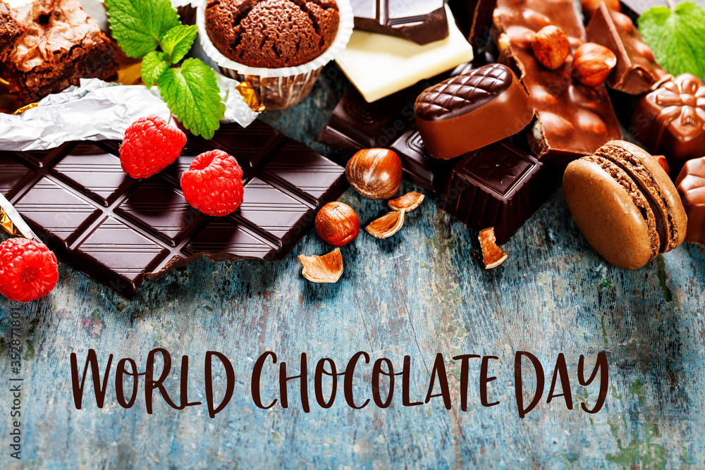 World Chocolate Day concept. Chocolate on blue wooden background Stock ...