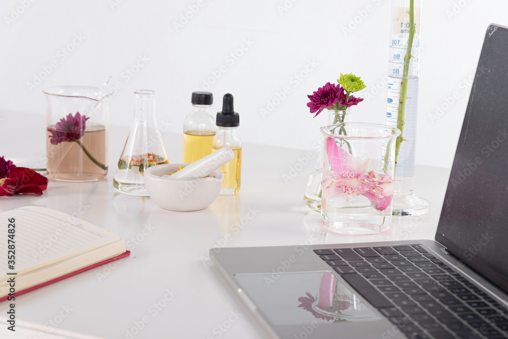 In laboratory,scientists teamwork with microscope,lab tubes,flask make ...