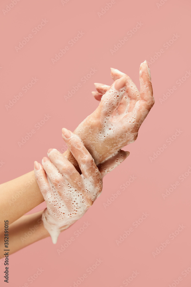 Washing Hands. Female Arms Covered With Soap Foam Against Pink ...