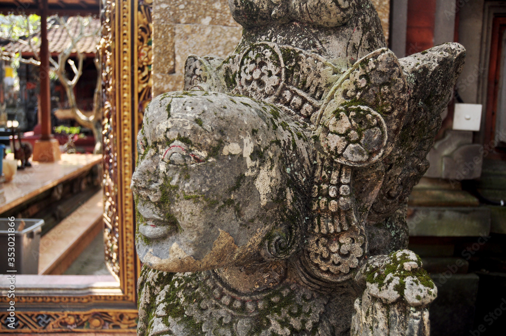 Sculpture and carved antique deity angel god of hindu statue balinese ...