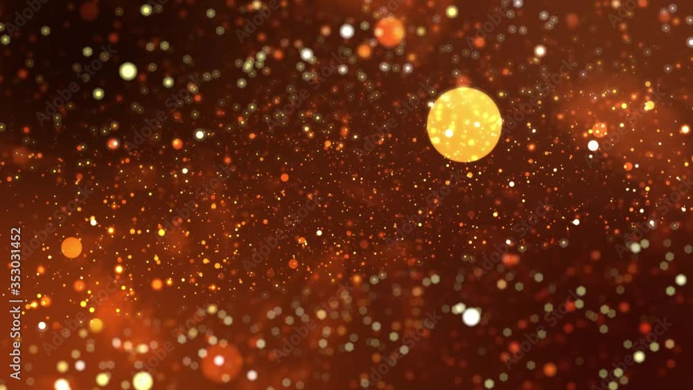 Gold dust particles. 4K abstract motion background of a cloud of ...