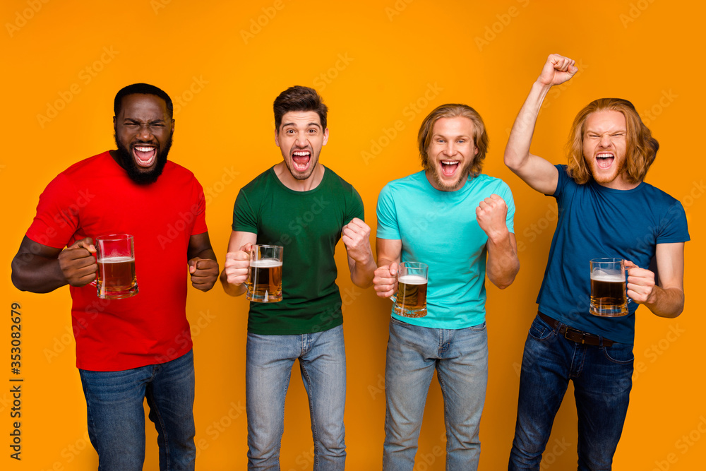 Ecstatic crazy four pals men in pub watch football championship ...