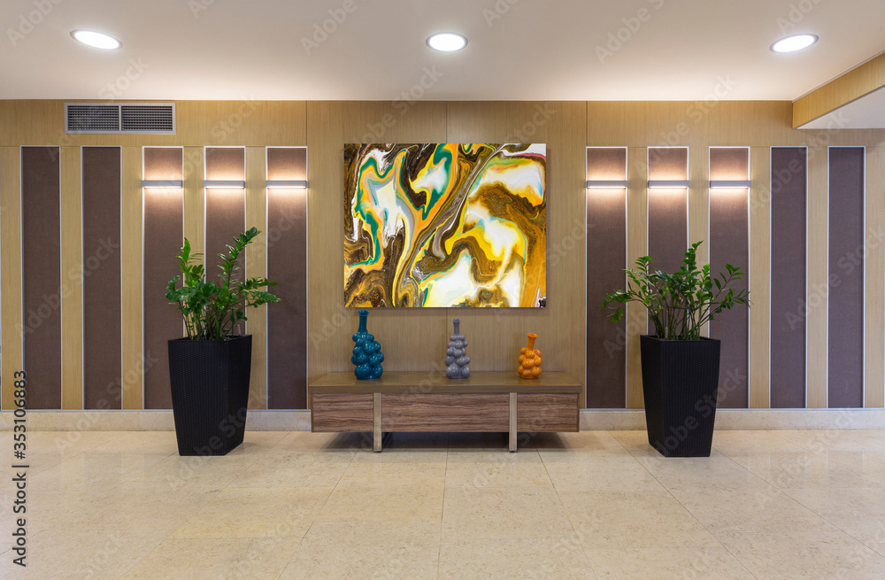 Hotel room with picture and potted plants Stock Photo | Adobe Stock