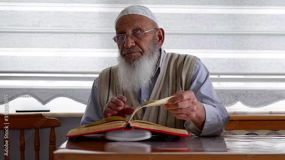 Close-up of an Elderly Muslim Turkish Man's face who is reading Holy ...