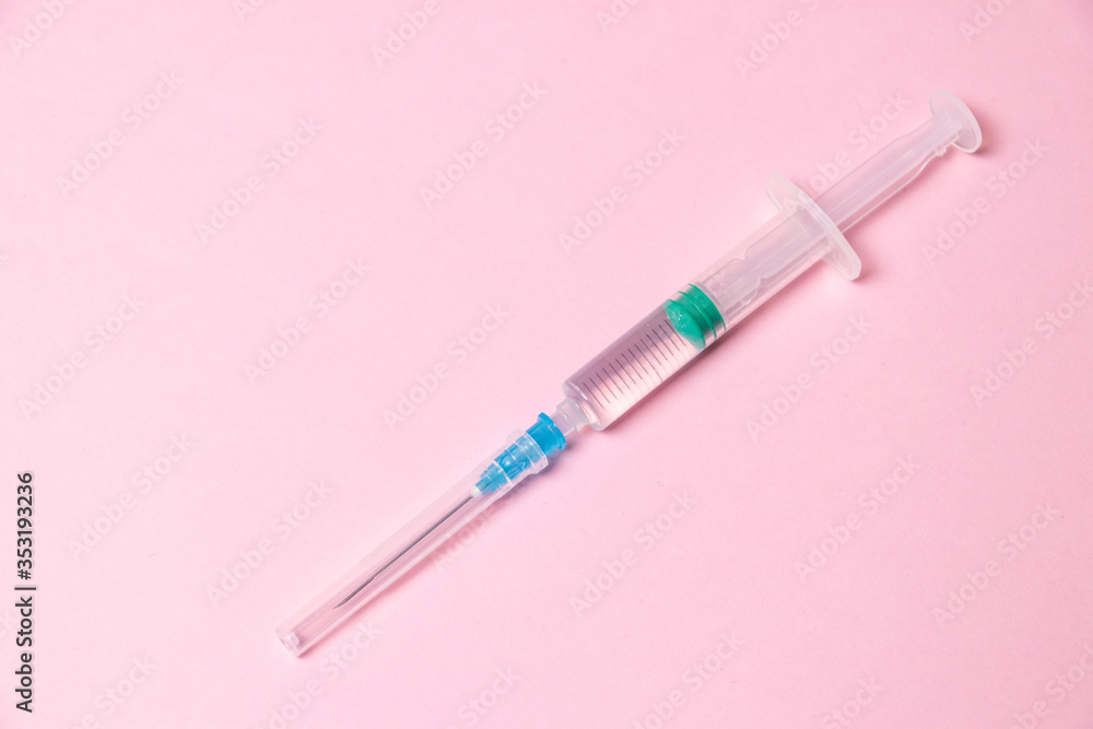 Parts of medical syringe isolated on pink background. Needle, syringe ...